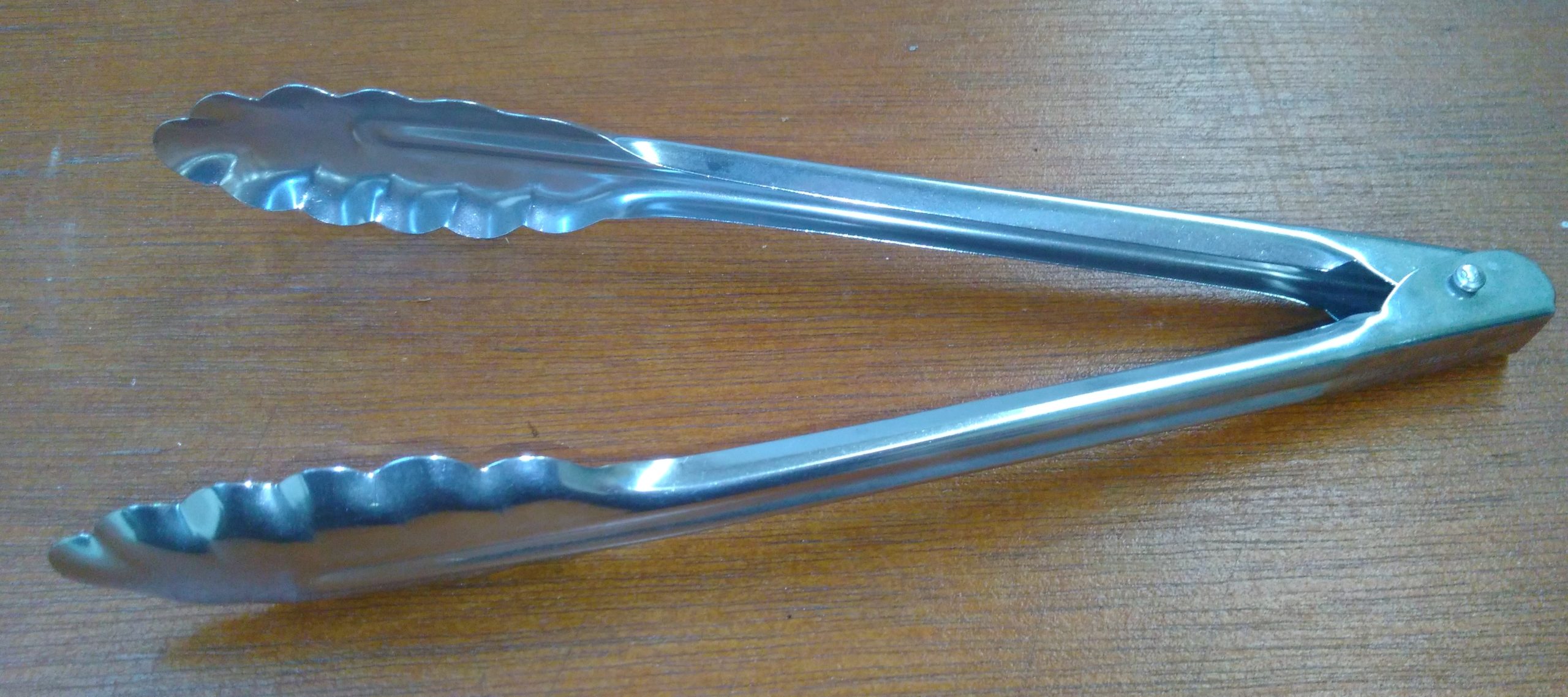 Pince en inox - Breizh'Loc reception